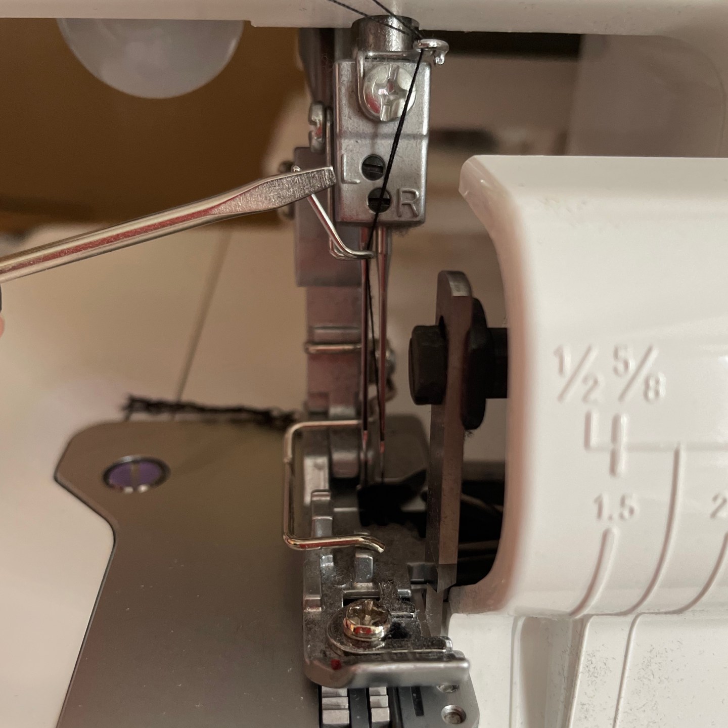 Attaching elastic to create a waistband with a cover stitch machine ...
